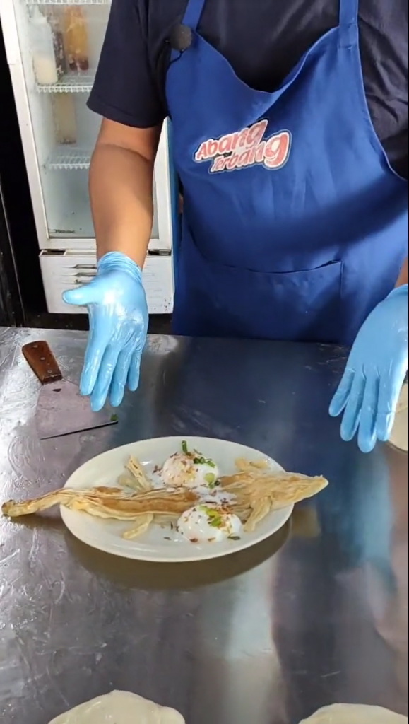 WATCH: Roti canai seller 'Abang Terbang' stuns M'sians with realistic ...